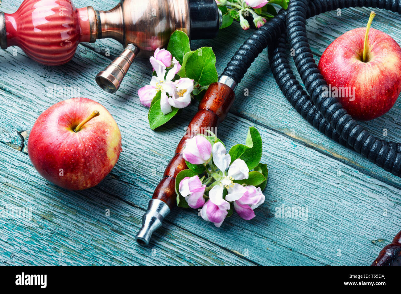 Oriental smoking hookah. Arabian shisha with apple. Hookah and apple ...