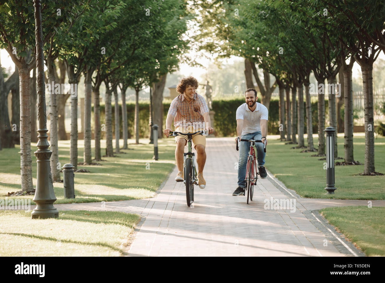 Two men cycling together hi-res stock photography and images - Alamy