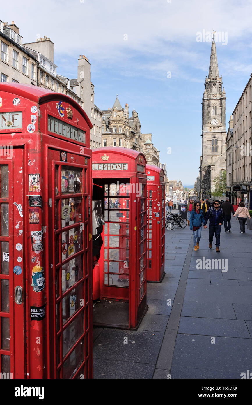 Red telephone boxes along the high, top end of the royal mile Edinburgh ...