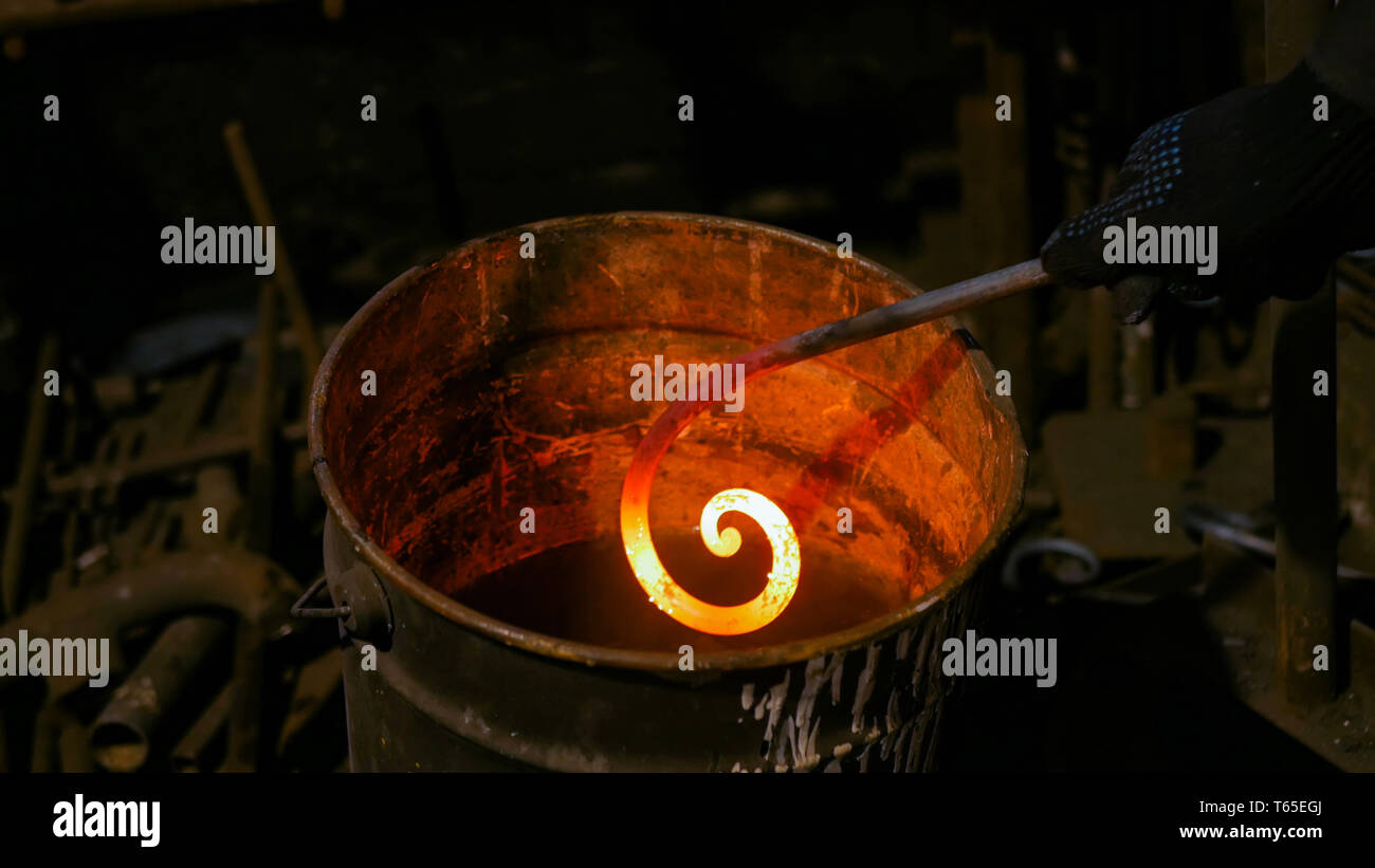 Hot iron water quench hi-res stock photography and images - Alamy