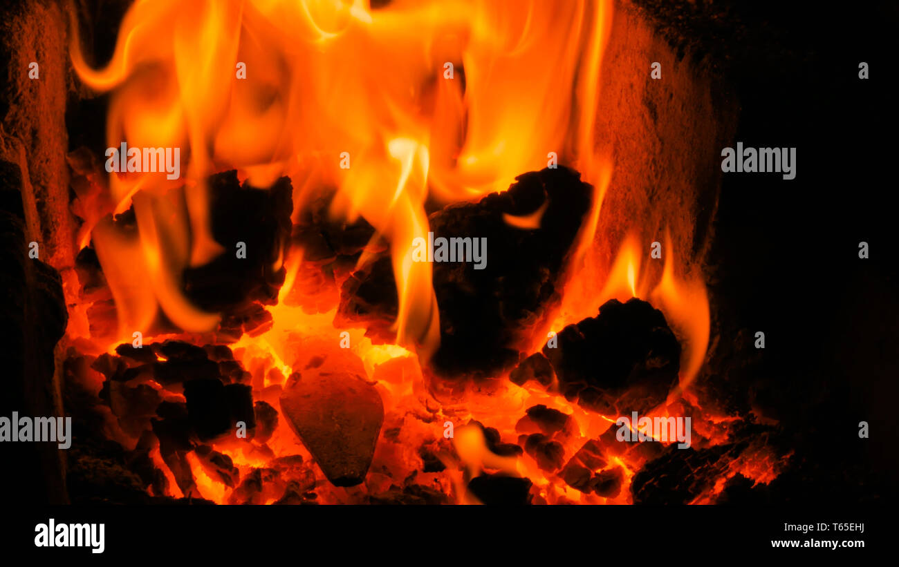 Burning fire in furnace Stock Photo - Alamy