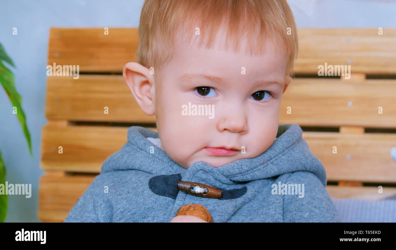 Portrait of pensive little boy Stock Photo - Alamy