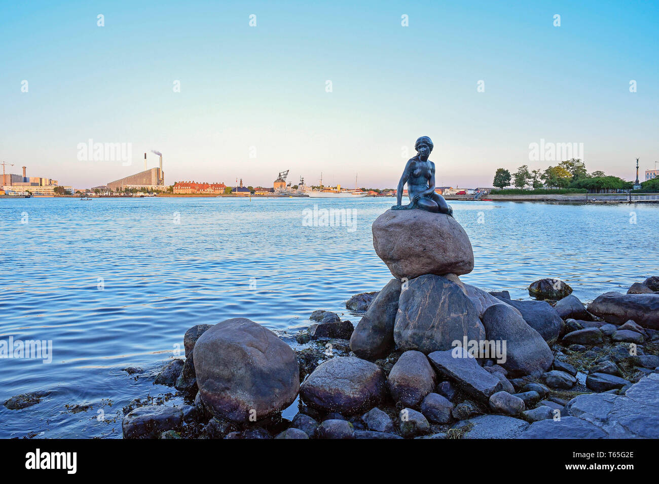 Denmark, Copenhagen, The Little Mermaid is a bronze statue by Edvard Eriksen, depicting a ...