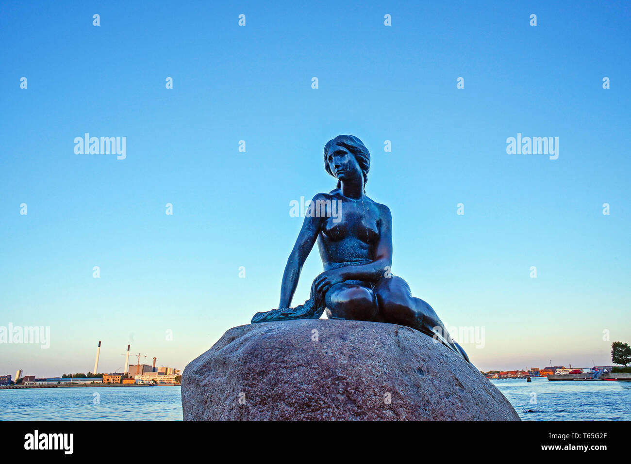 Denmark, Copenhagen, The Little Mermaid is a bronze statue by Edvard Eriksen, depicting a ...