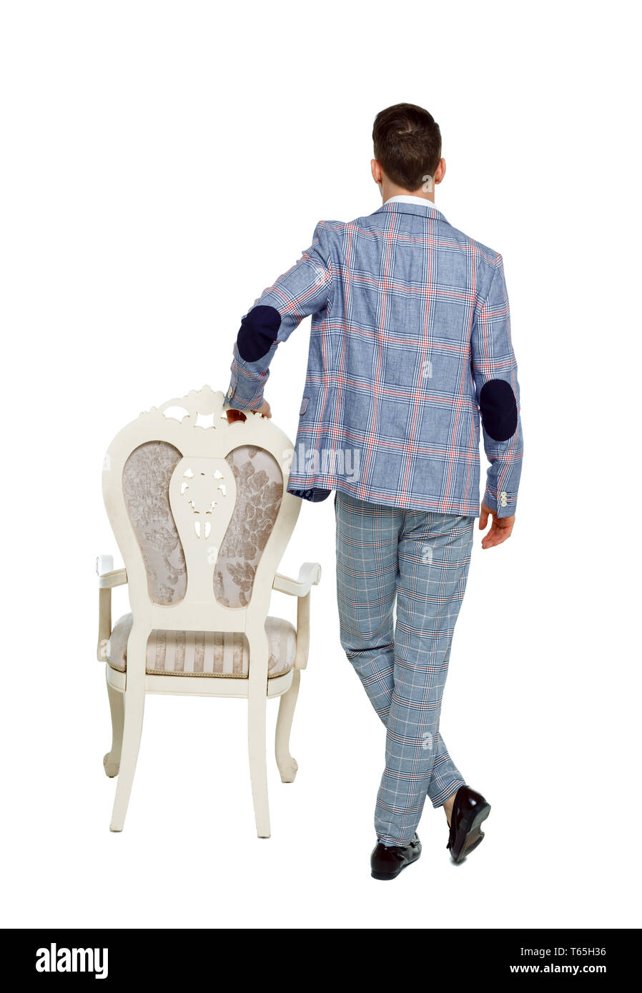 Man standing behind chair Cut Out Stock Images & Pictures - Alamy