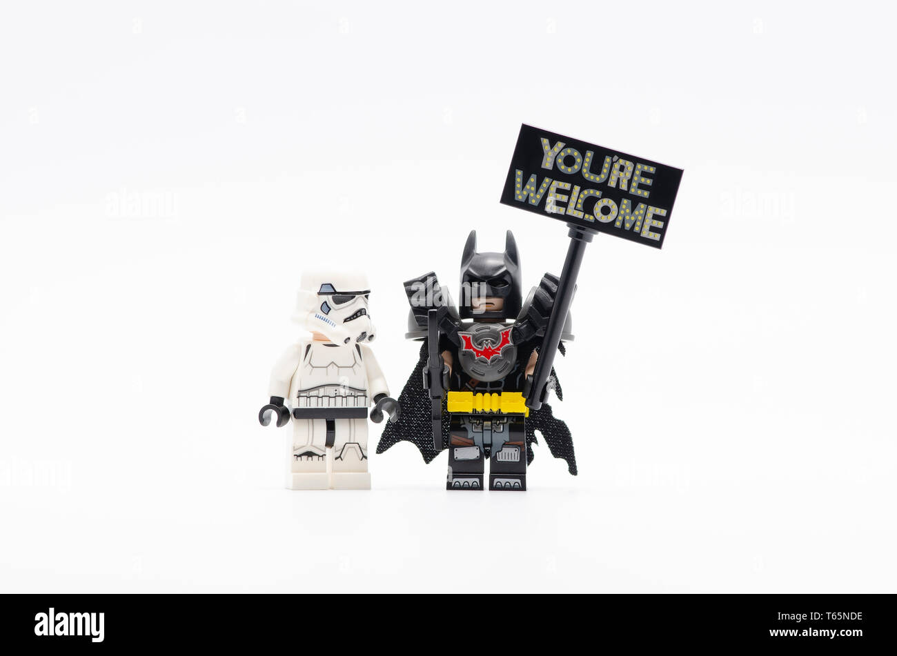 lego storm trooper with batman holding you are welcome sign. Lego ...