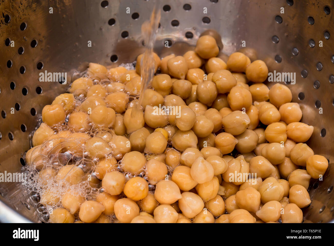 Washing chick peas hi-res stock photography and images - Alamy