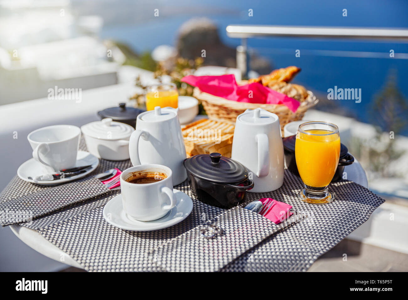 Breakfast for two by the sea, Greece Stock Photo - Alamy