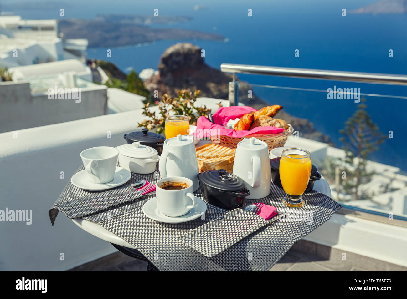 Breakfast for two by the sea, Greece Stock Photo - Alamy