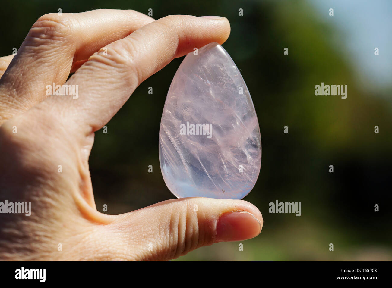 Hand rose quartz hi-res stock photography and images - Alamy