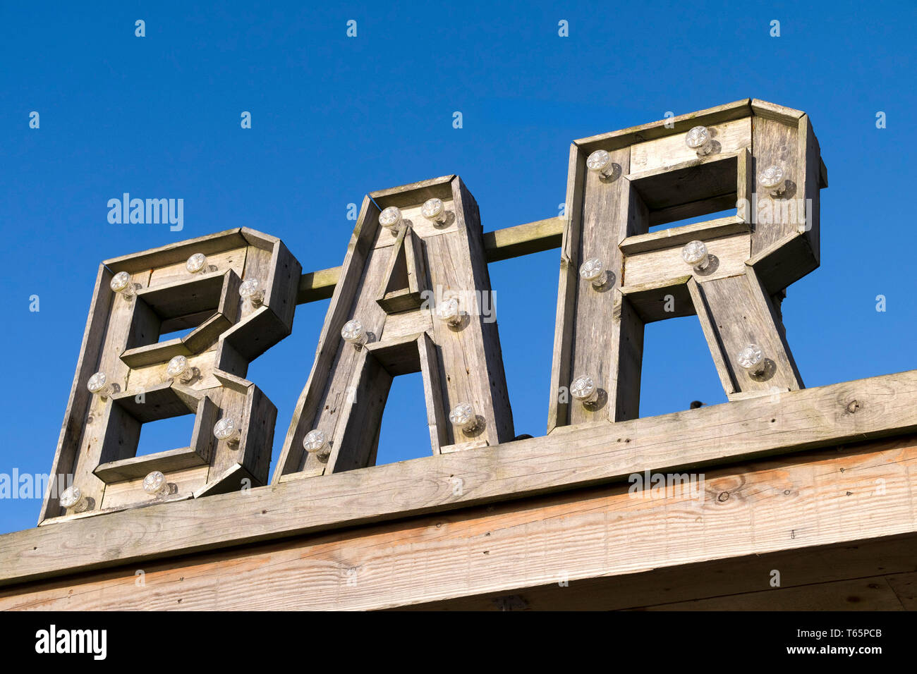 A wooden sign for the Bar at Fistral in Newquay in Cornwall Stock Photo ...