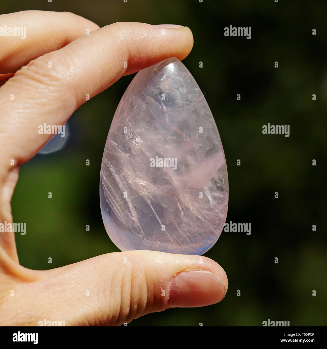 Female hand holding gemstone hi-res stock photography and images - Alamy