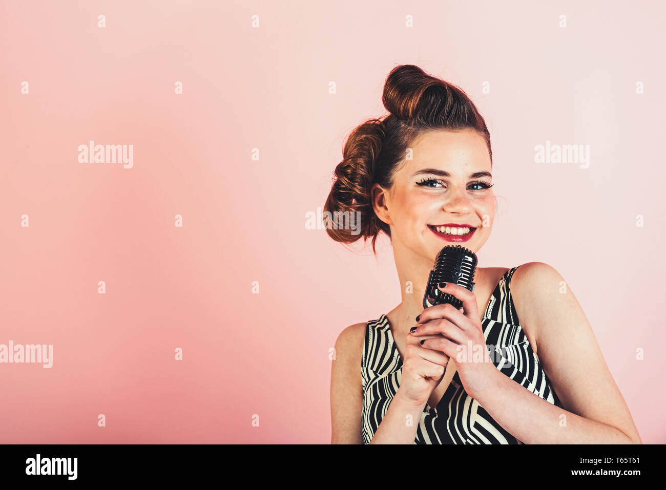 Girl in red singer performing hi-res stock photography and images - Alamy