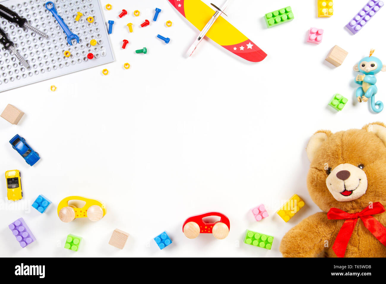 Colorful kids toys frame on white background. Top view. Flat lay Stock ...
