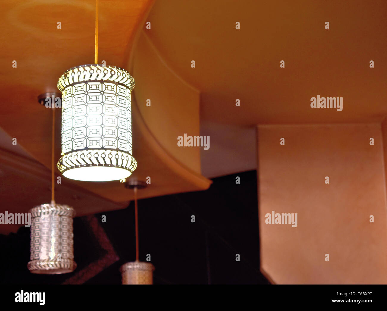 an ornate lamp inside a building Stock Photo - Alamy