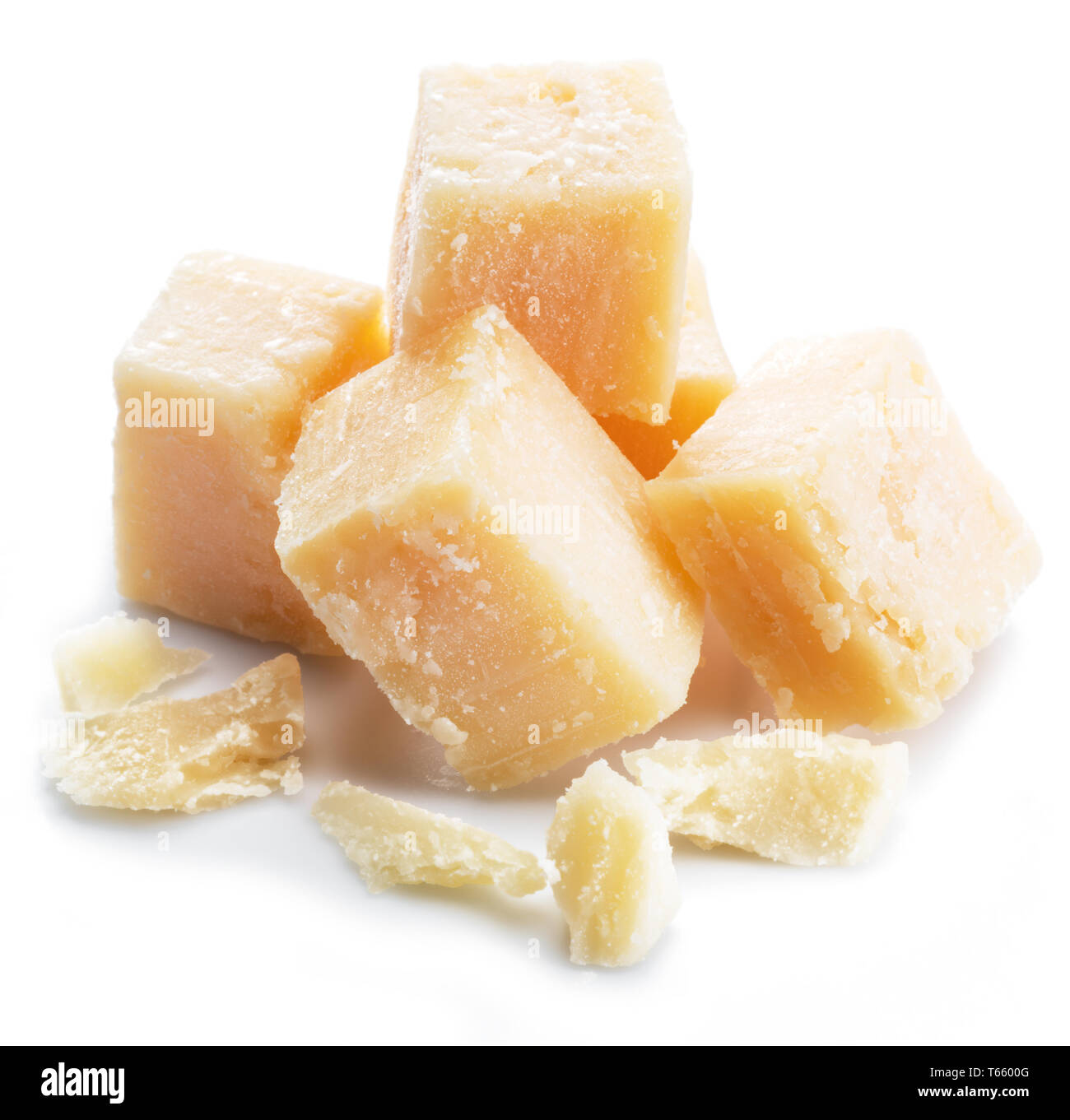 Parmesan cheese cubes isolated on white background Stock Photo - Alamy