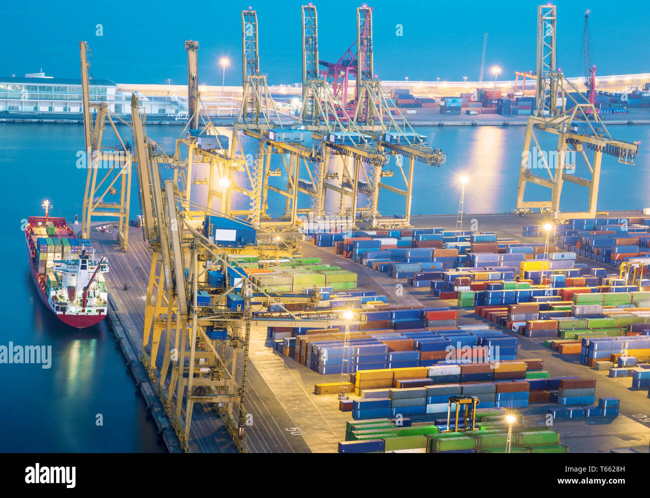 port with cargo at night Stock Photo - Alamy