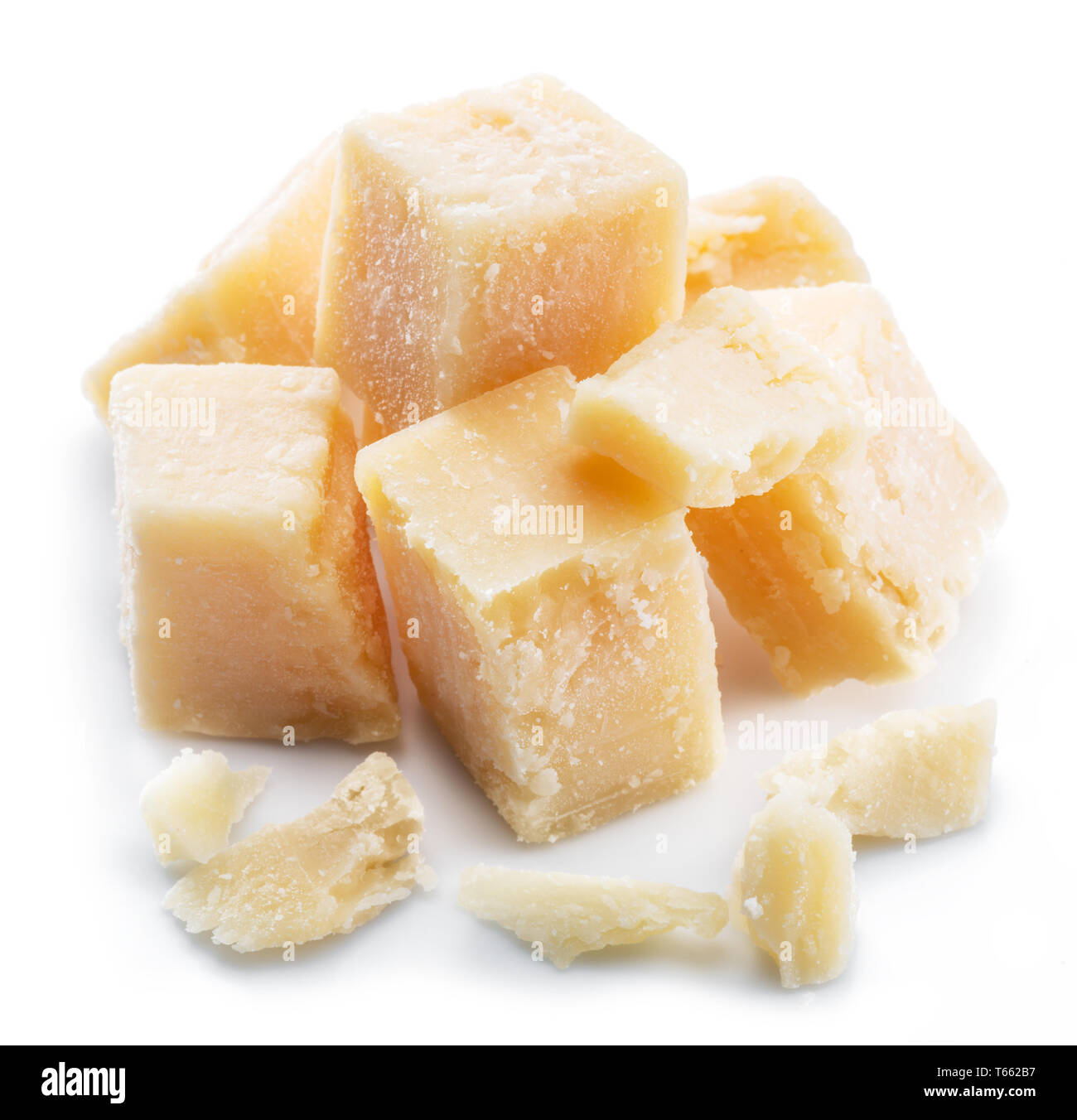 Parmesan cheese cubes isolated on white background Stock Photo - Alamy