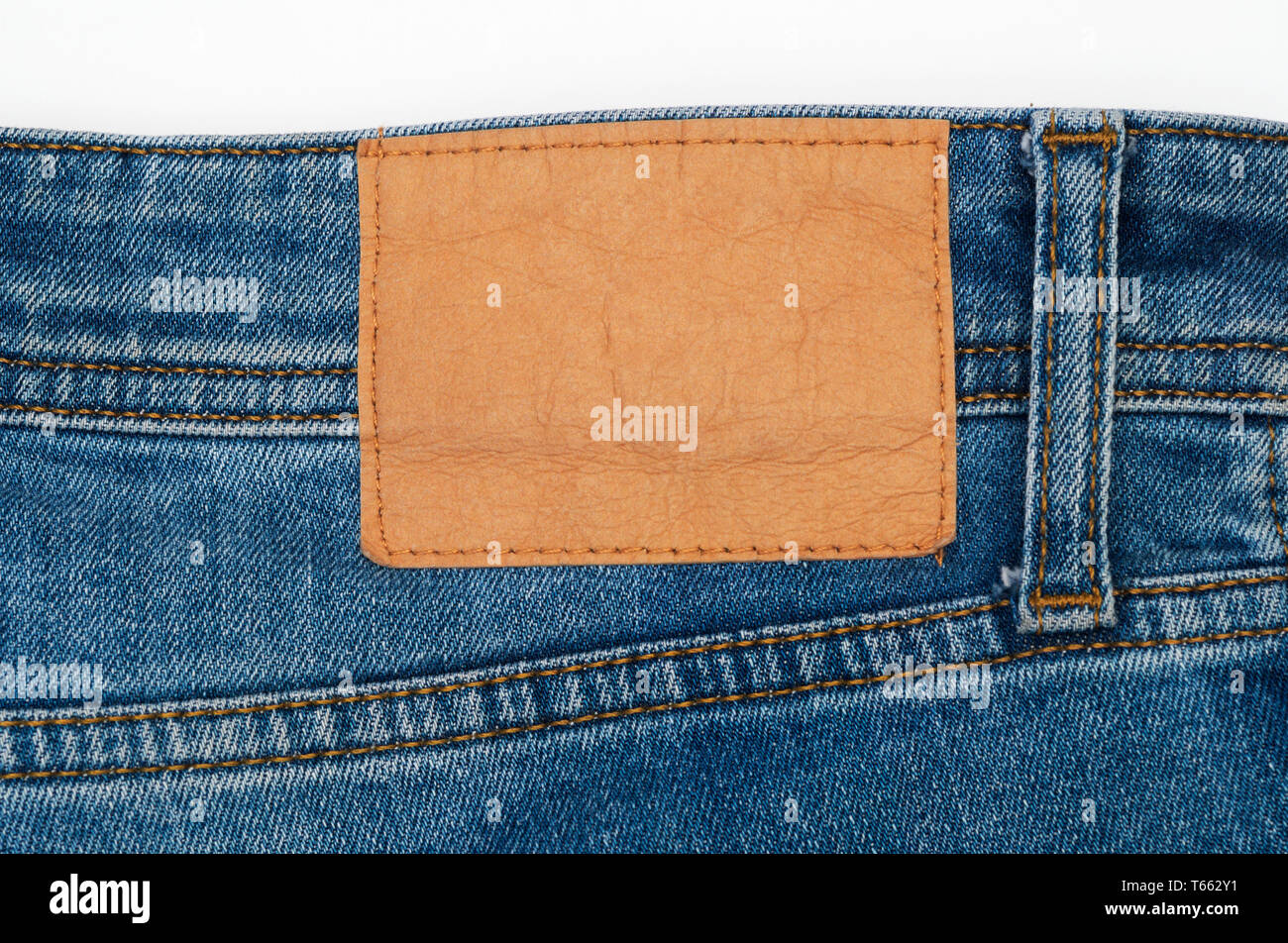 blank blue jeans leather label Stock Photo - Alamy