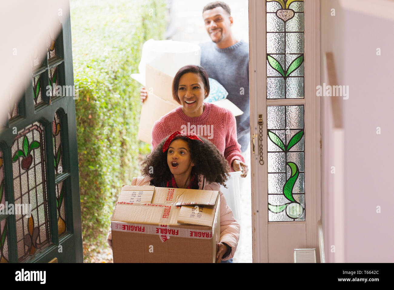 Group of people moving house hi-res stock photography and images - Alamy