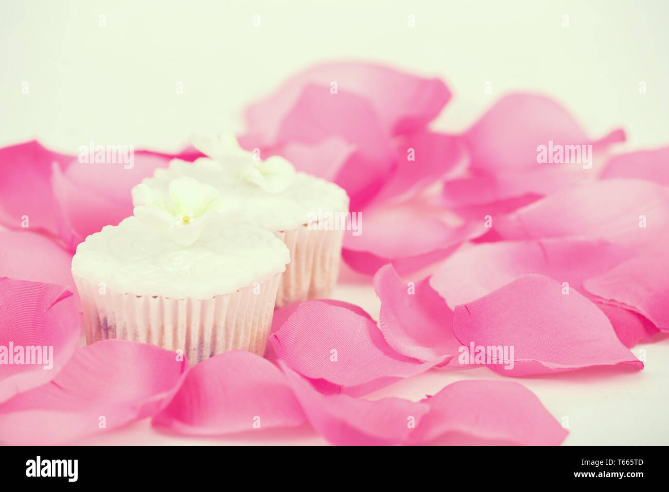 muffins with white icing Stock Photo - Alamy