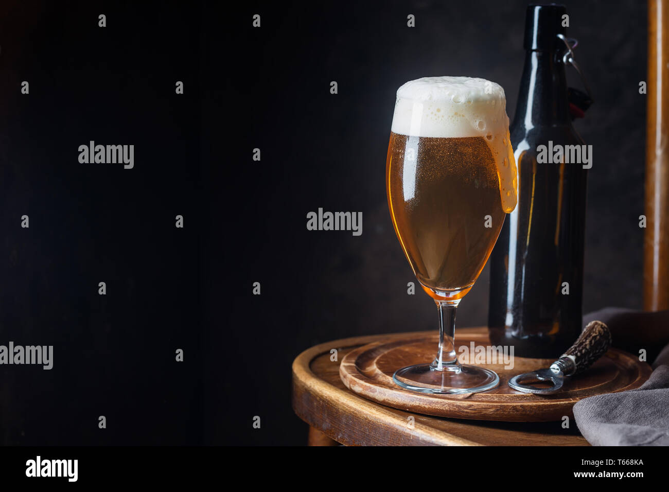 Glass beer on dark background with copy space Stock Photo - Alamy