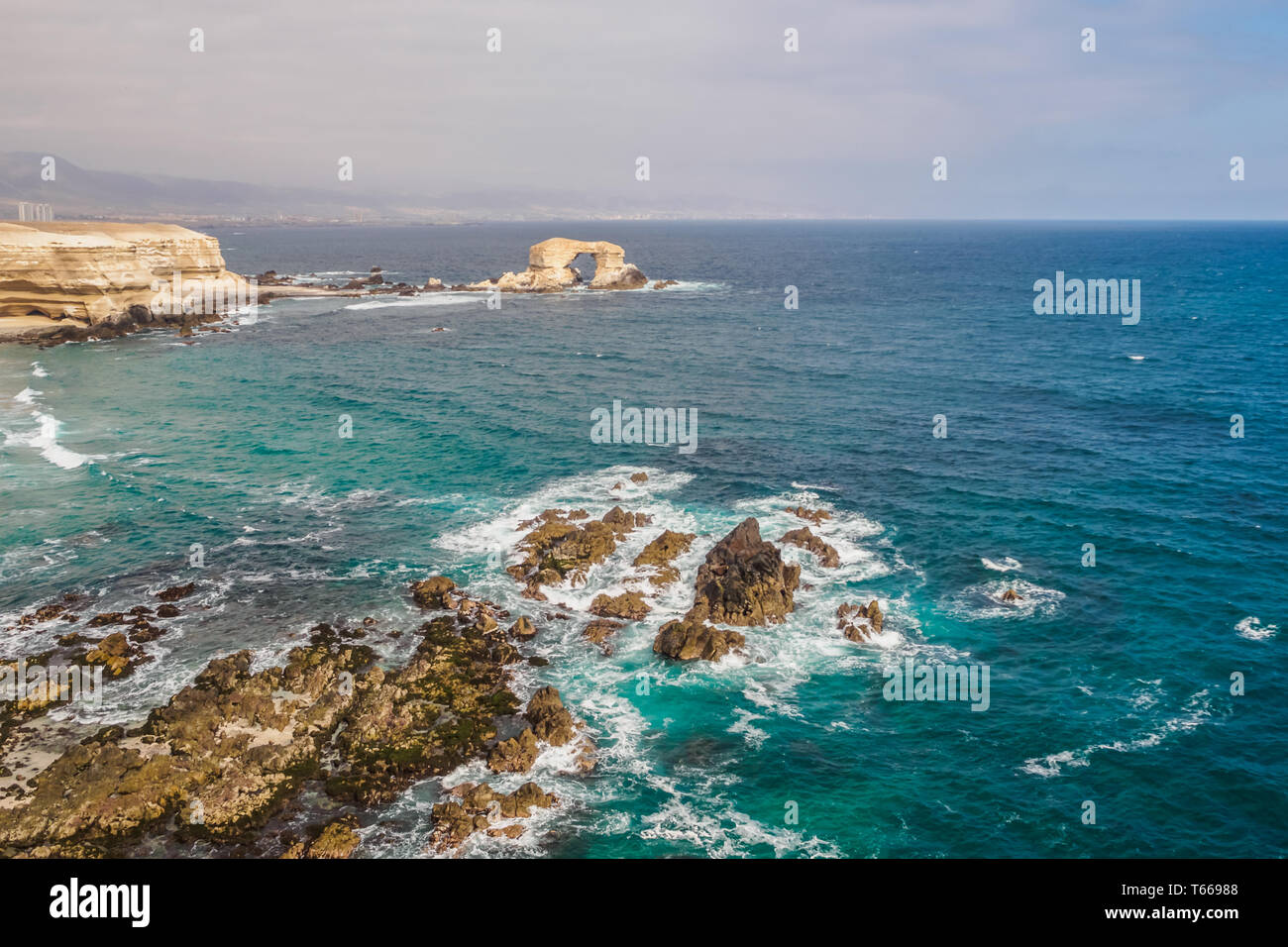Stone arch called "La Portada" on the north coast of Chile next to the ...