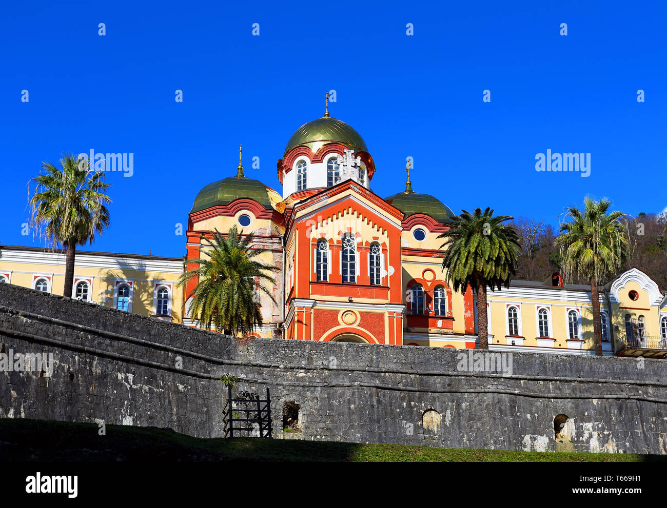 Old monastery on top of a hill among subtropical trees Stock Photo - Alamy