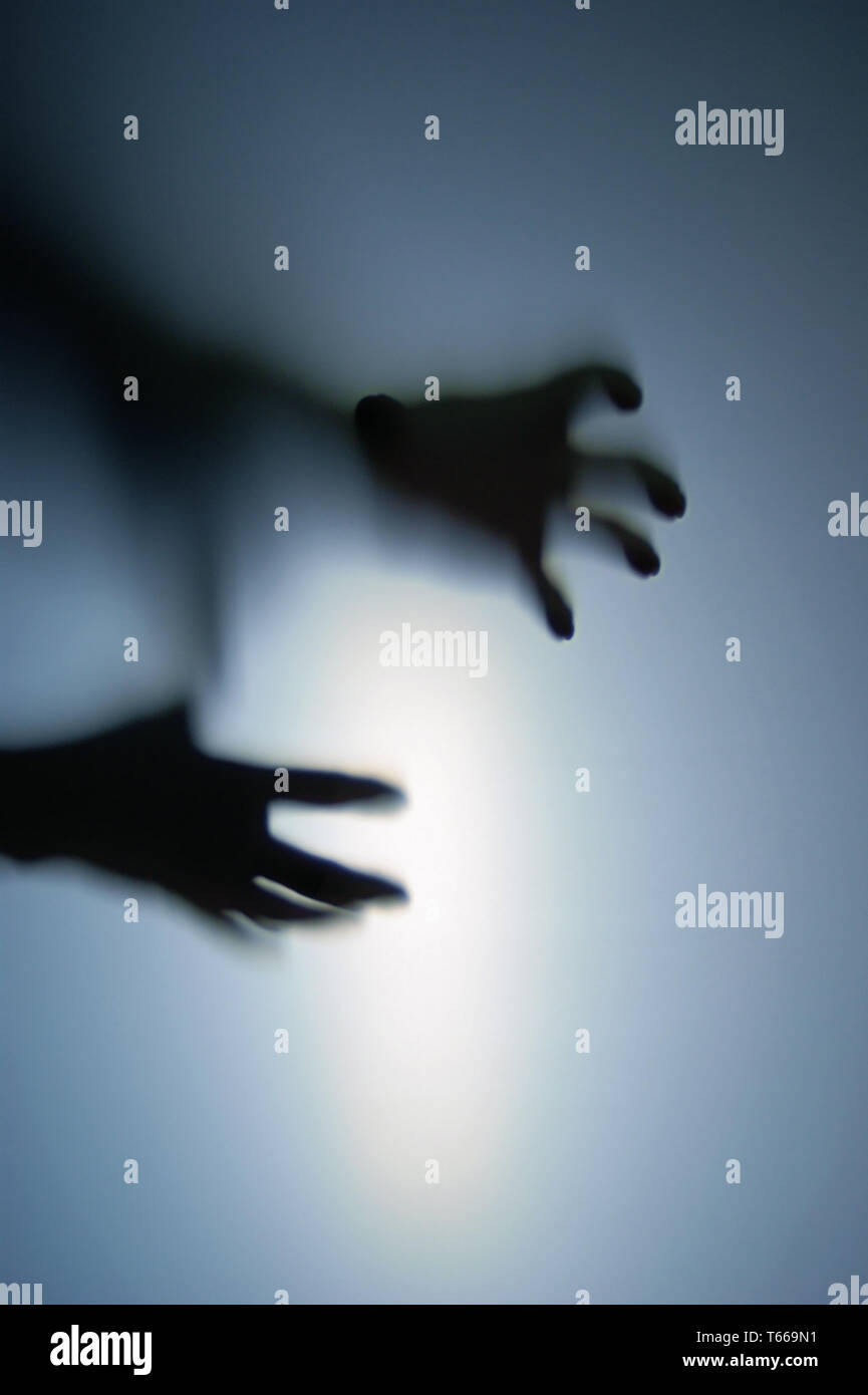 Dark hands, silhouette Stock Photo - Alamy