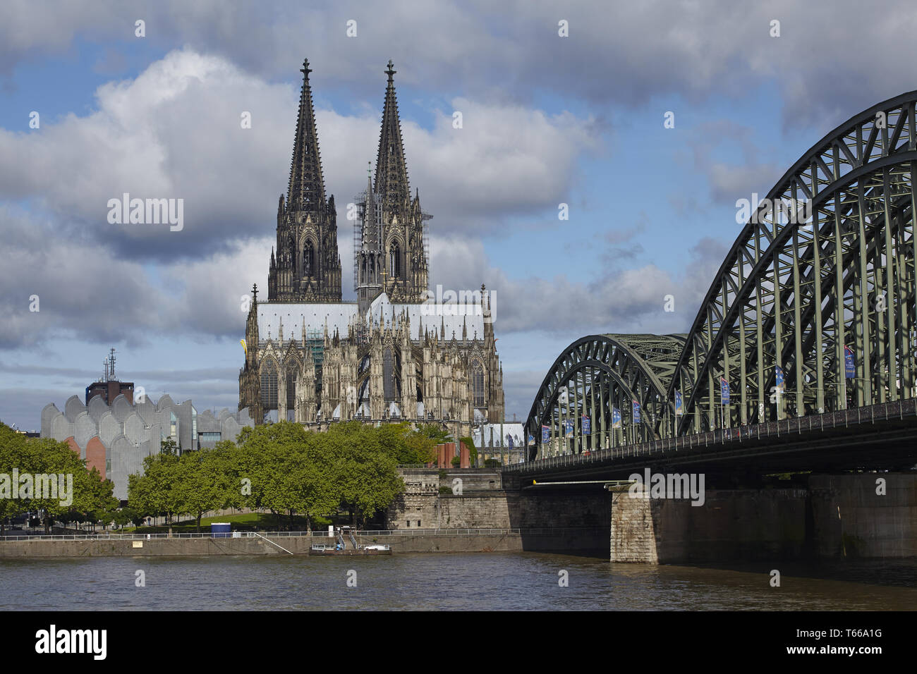 The Cologne Cathedral and the Hohenzollern railway bridge Stock Photo ...