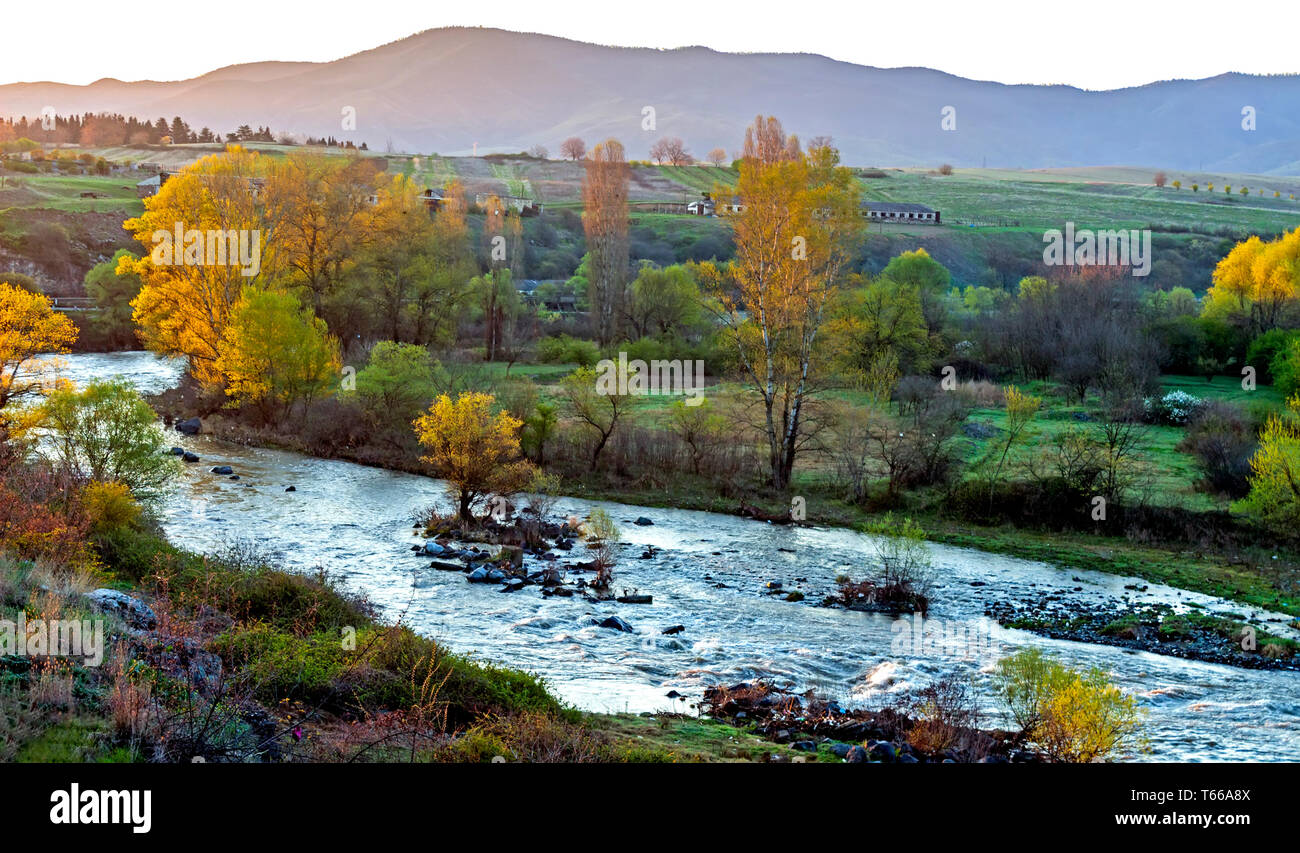 Landscape with the river Hrazdan and a mountain ridge in Armenia on an ...