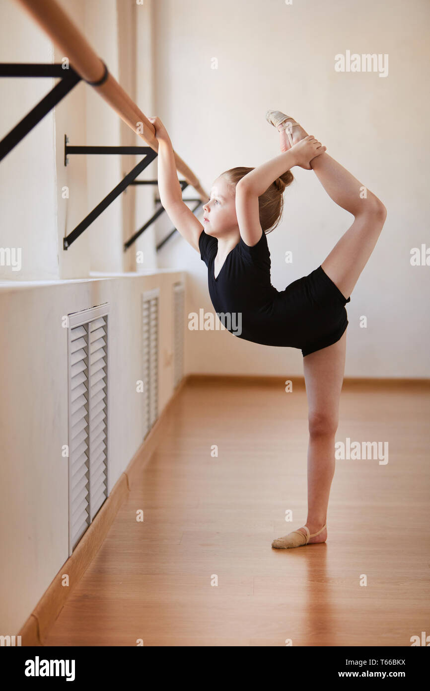 Flexible Little Girl Stock Photo - Alamy