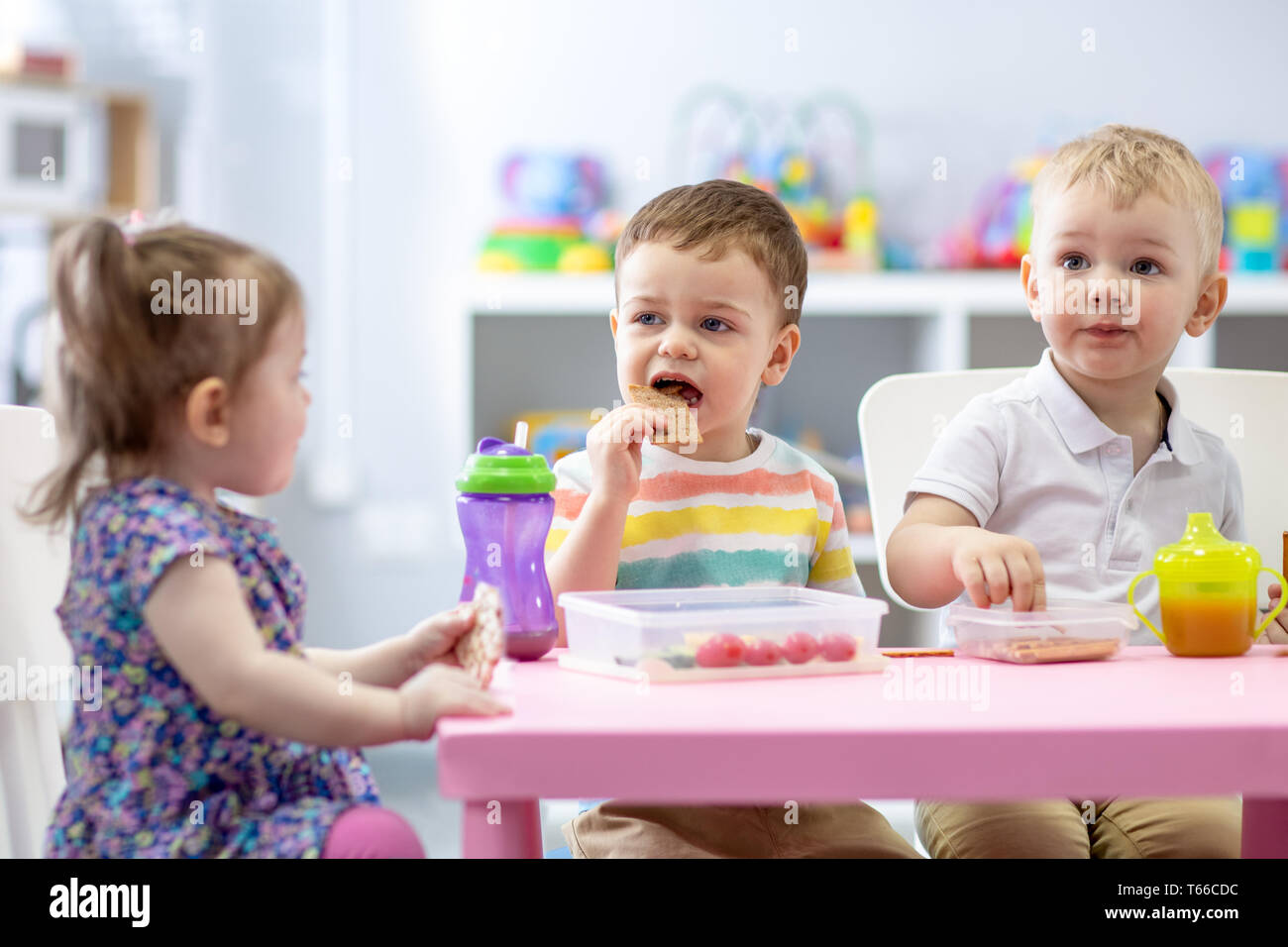 Group Of Toddlers Eating