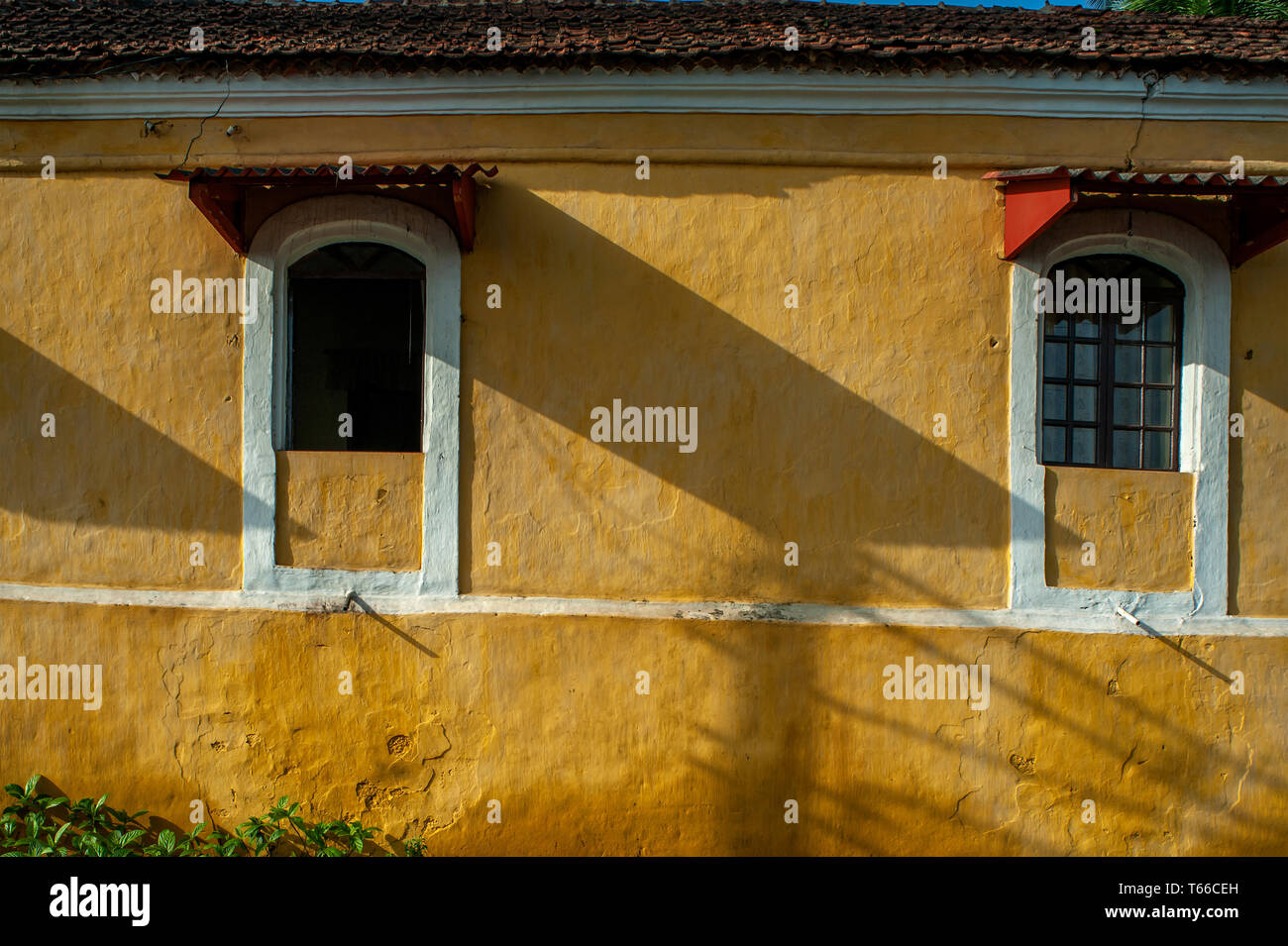 09-Jun-2009-Goan heritage old house-yellow wall and red Window Shed of ...