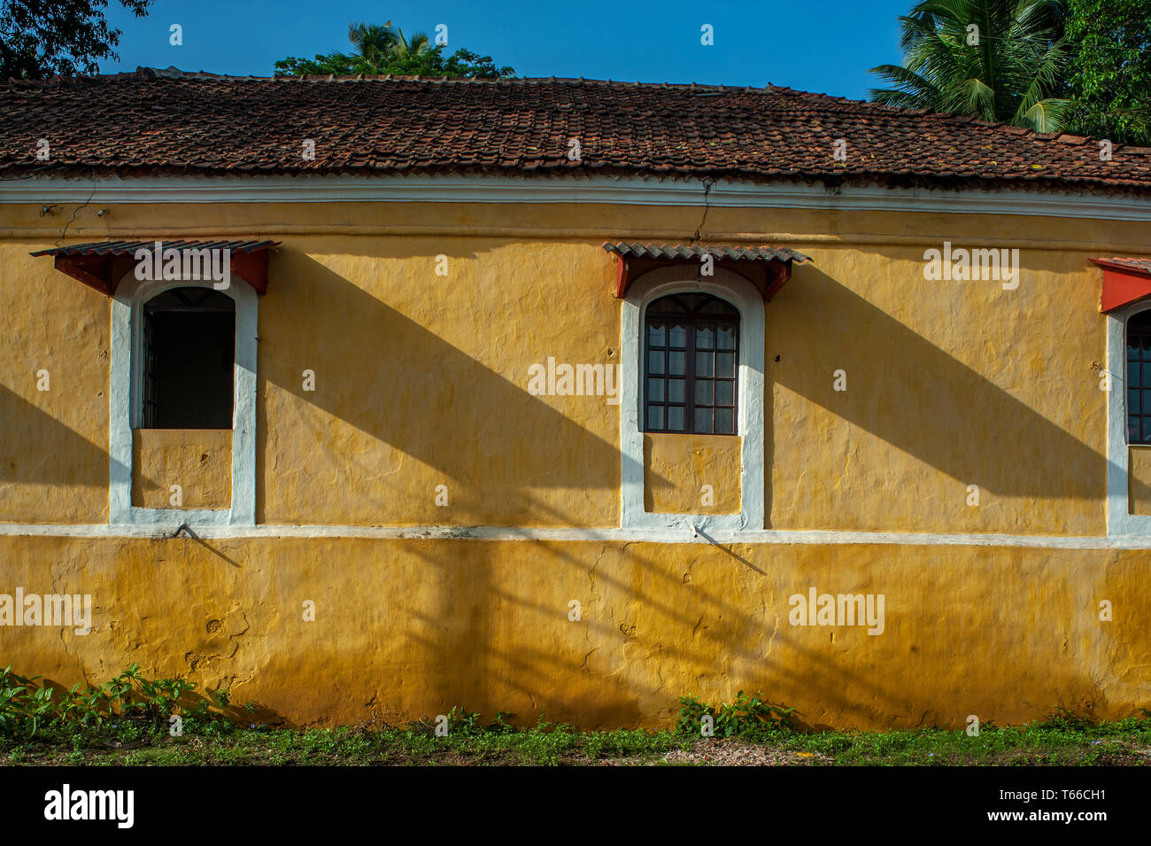 09-Jun-2009-Goan heritage old house-yellow wall and red Window Shed of ...