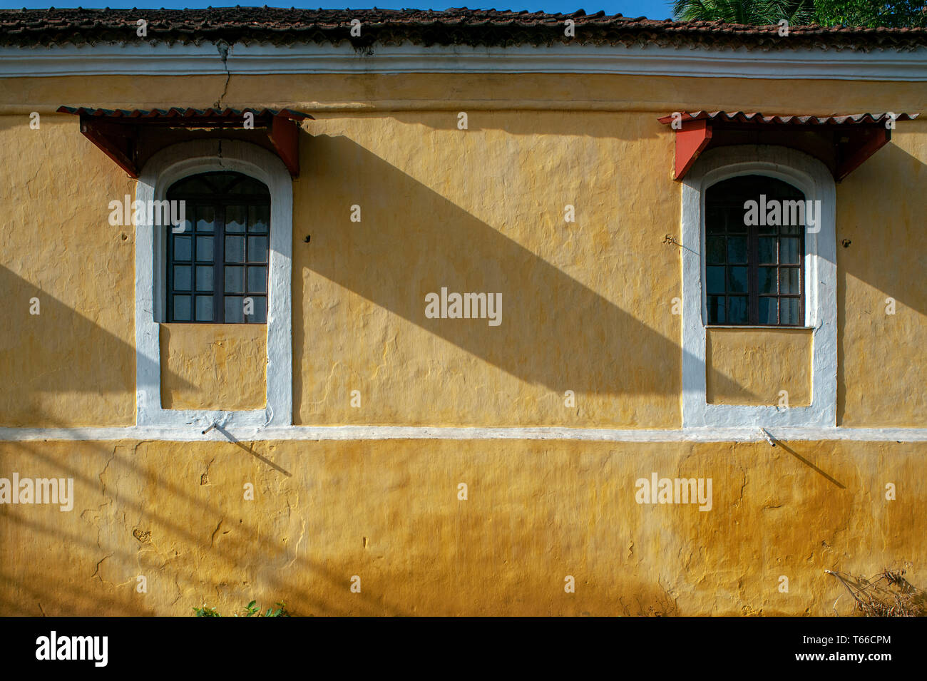09-Jun-2009-Goan heritage old house-yellow wall and red Window Shed of ...