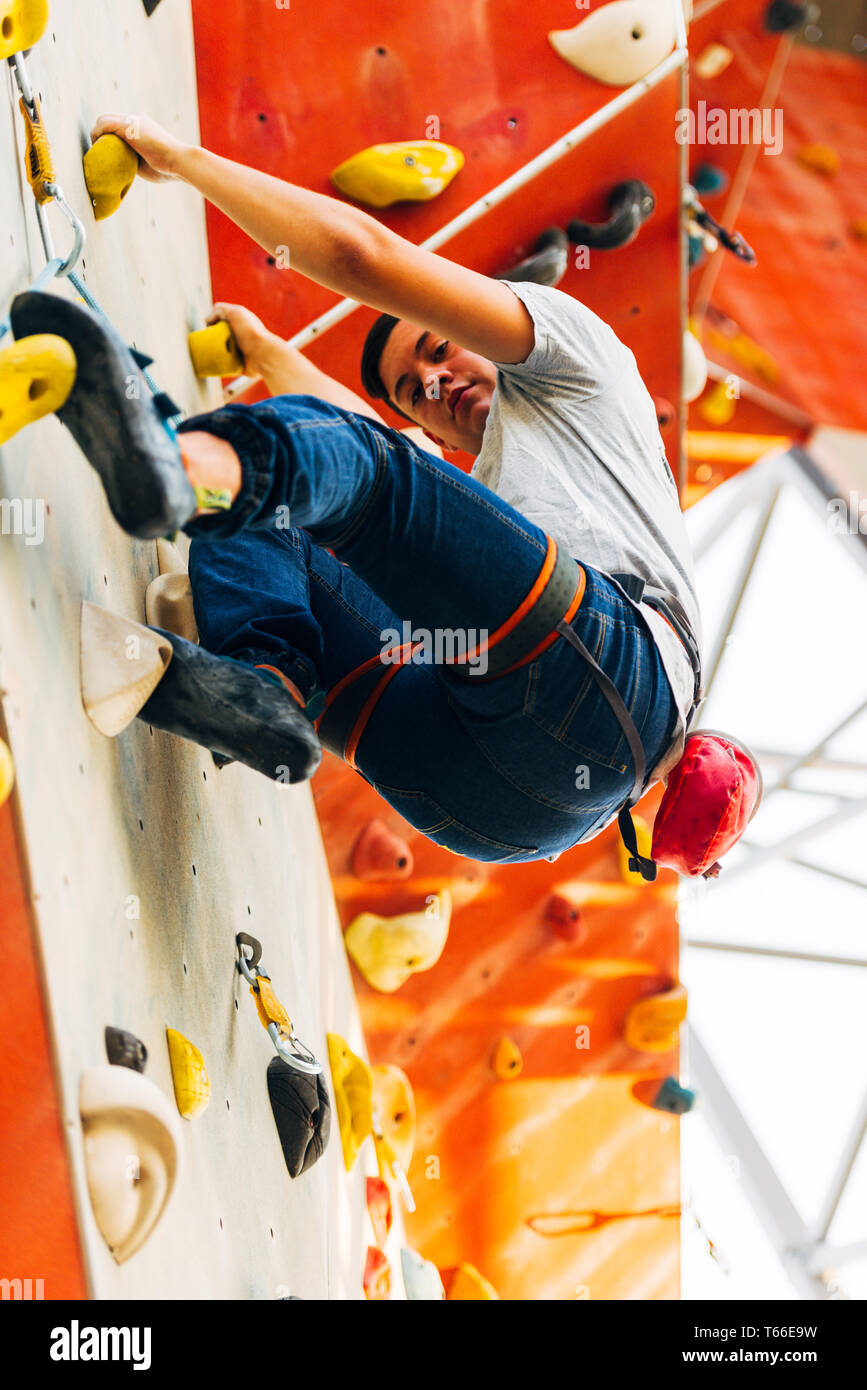 Active lifestyle and bouldering climbing, reaching the top concept ...