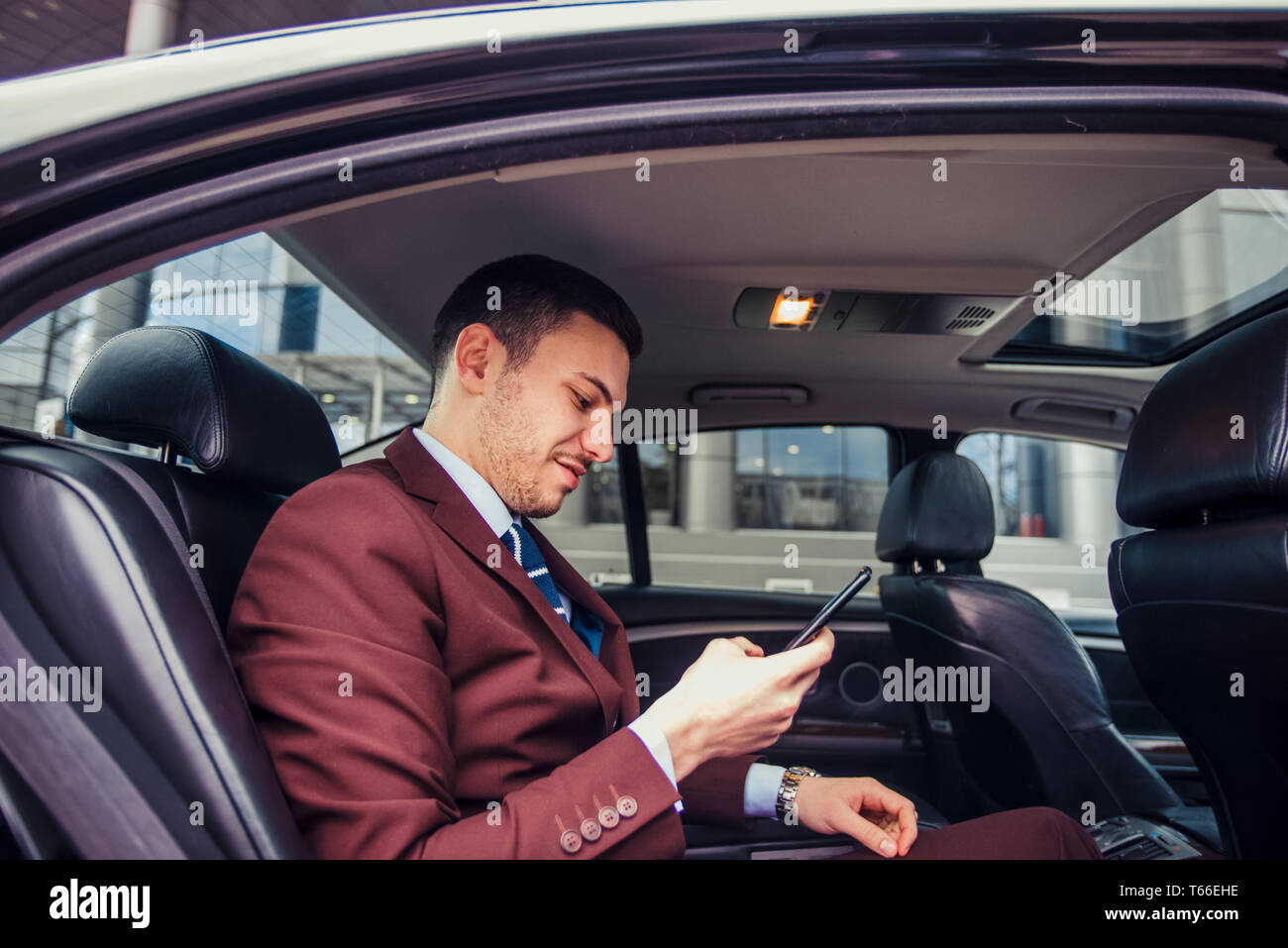Businessman driving in limo hi-res stock photography and images - Alamy