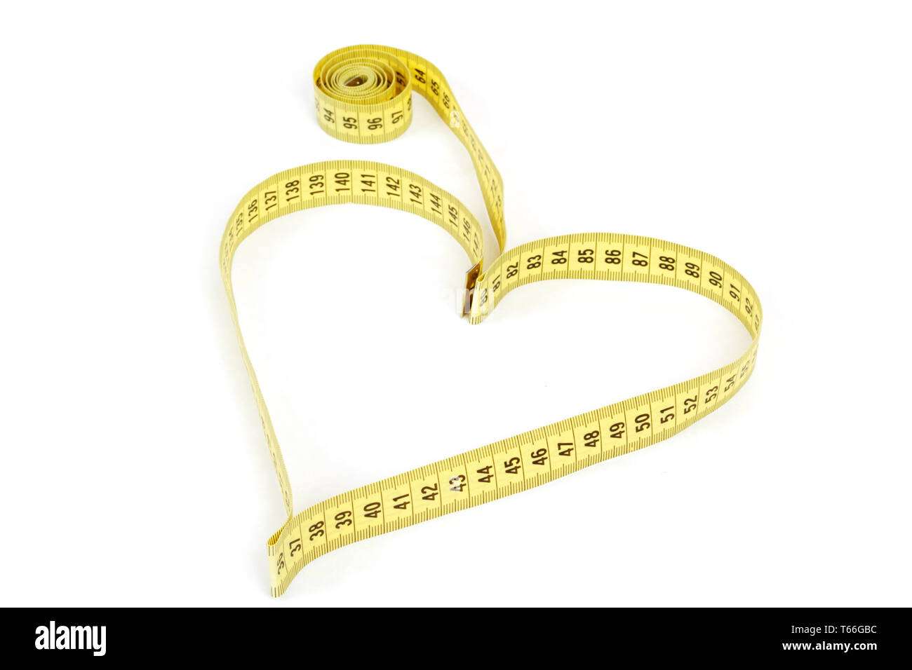 Tape measure heart shape - health, weight concept Stock Photo - Alamy