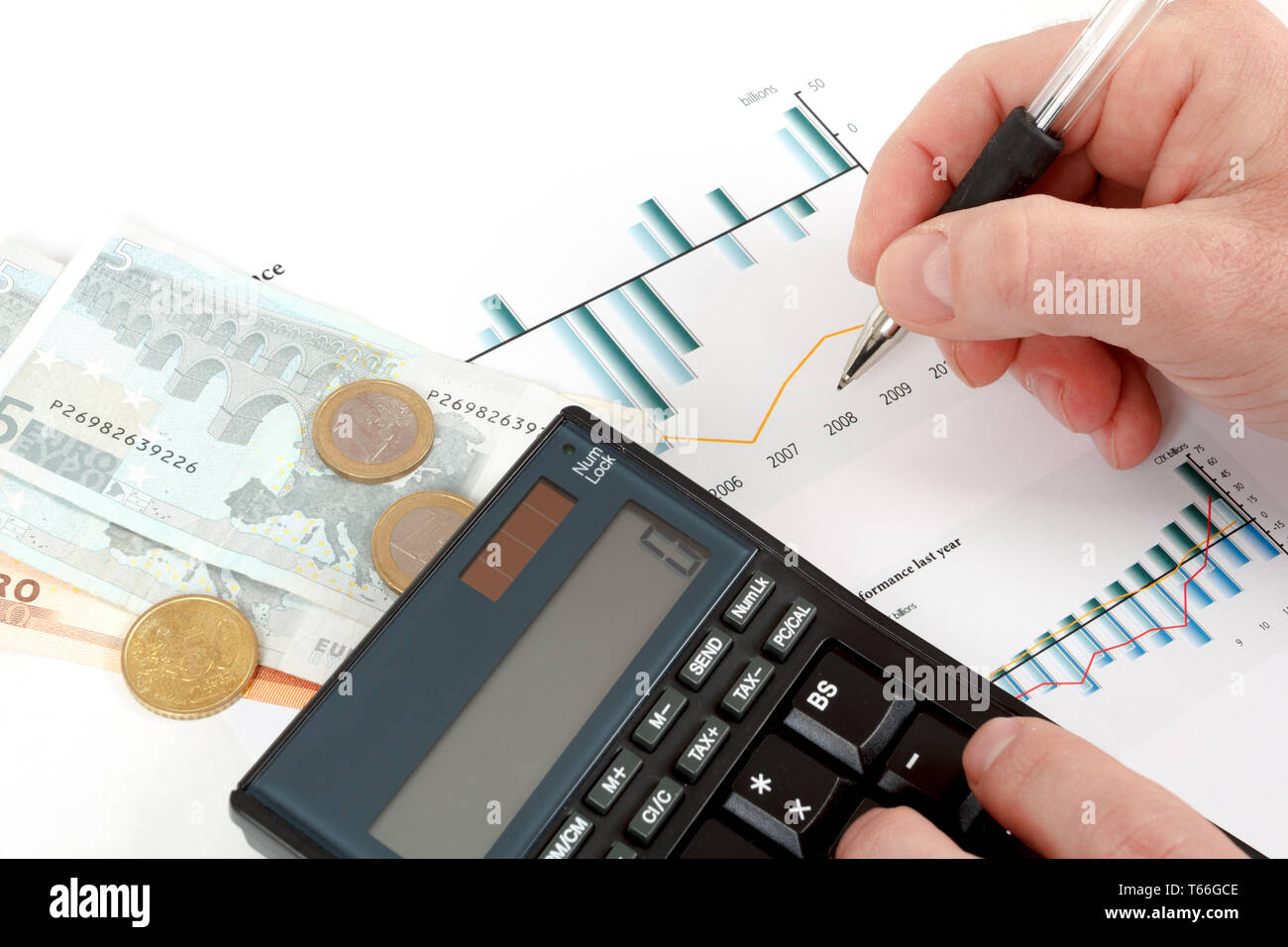 analyzing stock graph, businessman workplace Stock Photo - Alamy
