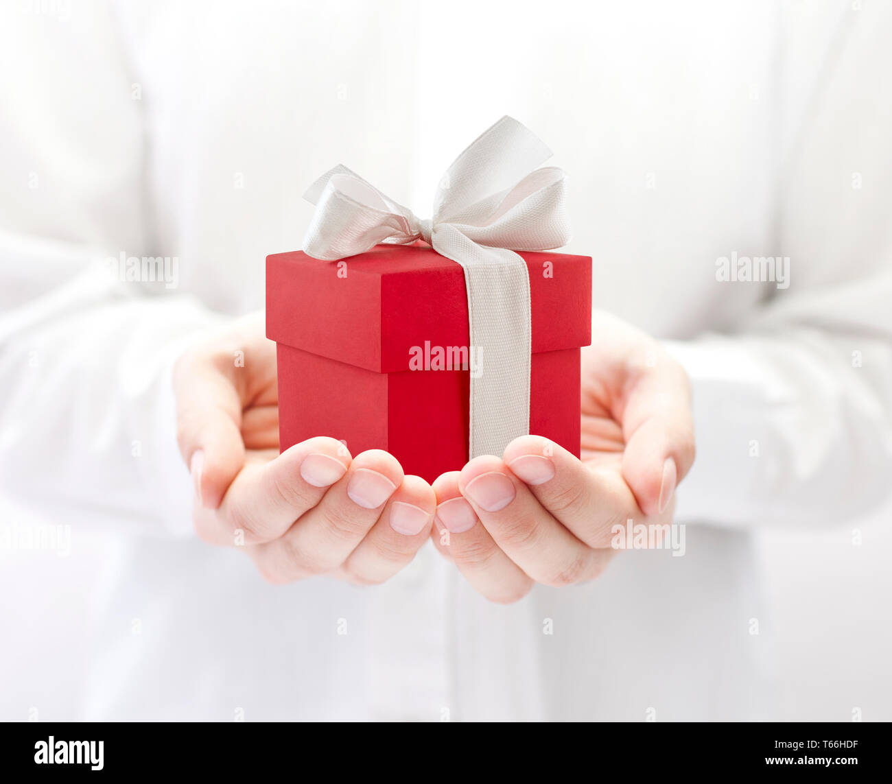 Present hand hi-res stock photography and images - Alamy