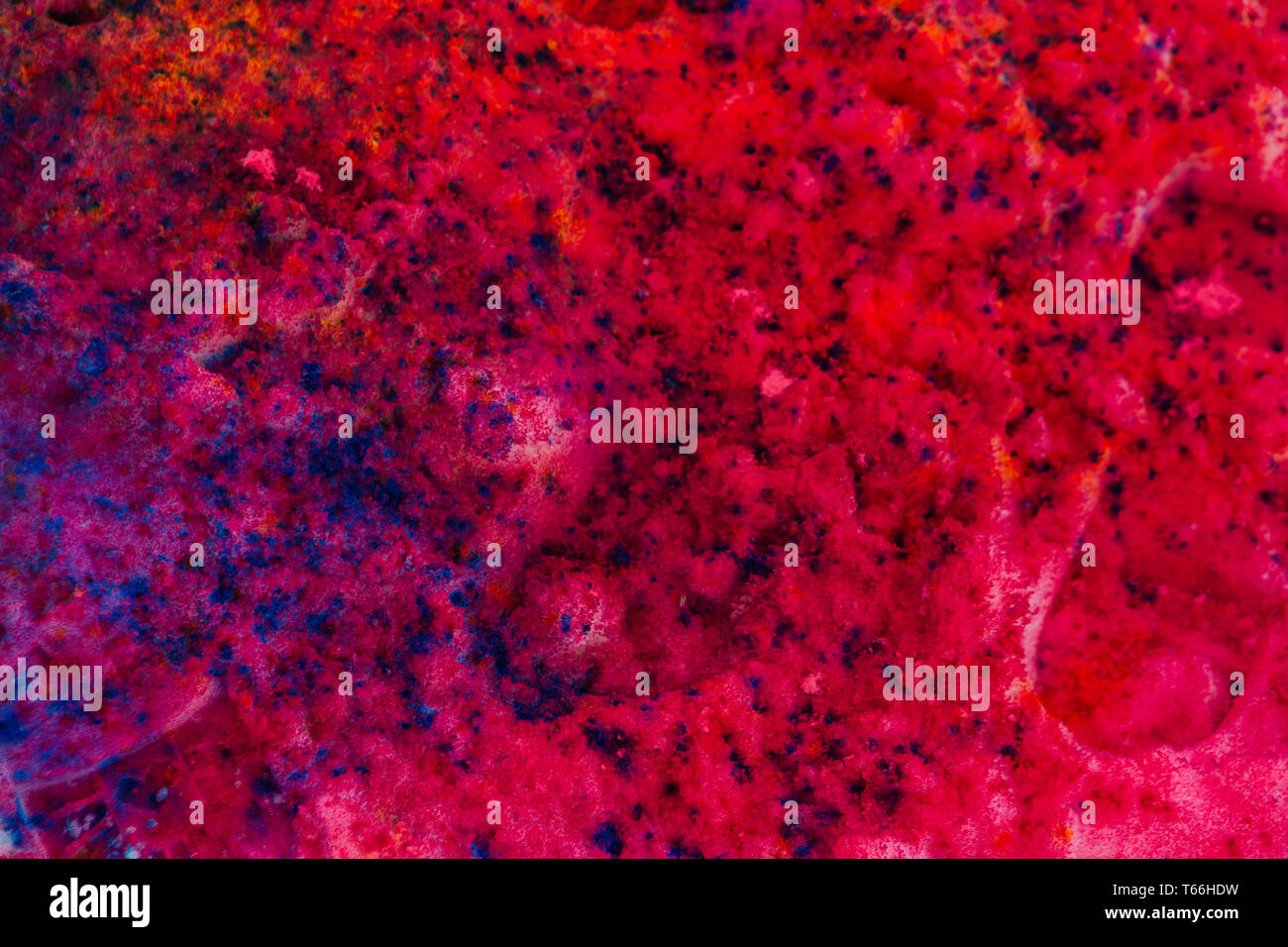 Background of colorful Holi powder in multiple colors on snow surface ...