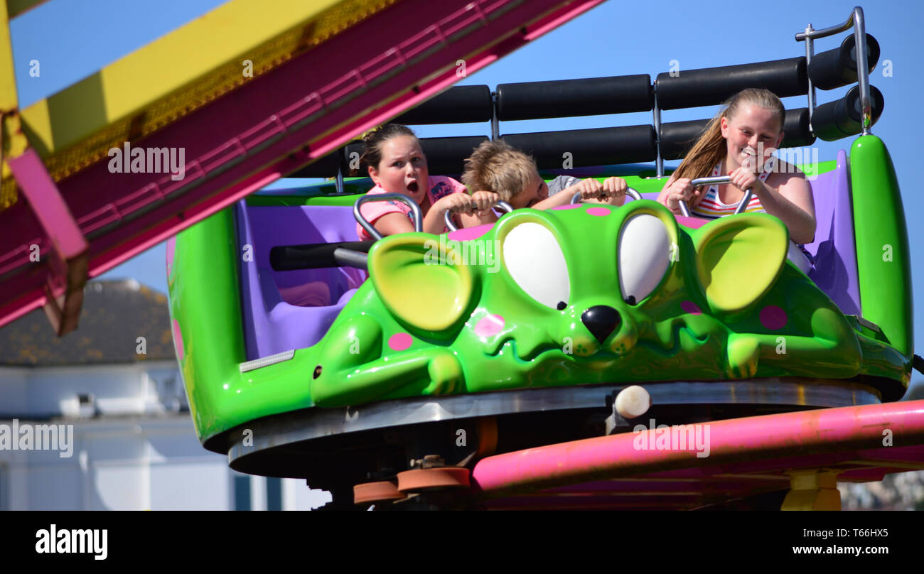 Seaside fairground fun Stock Photo - Alamy