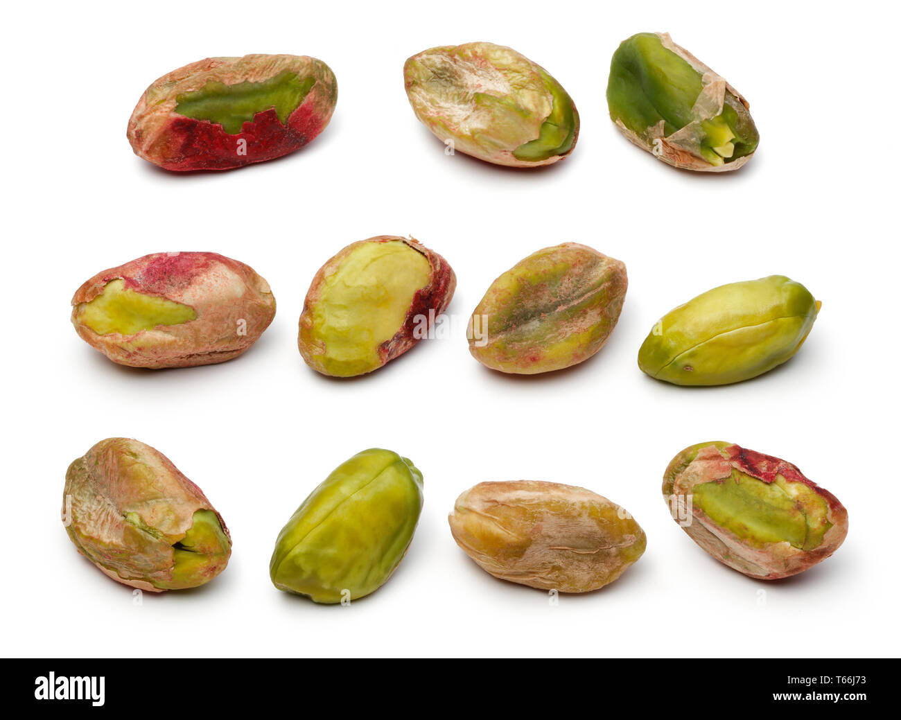 Peeled pistachio nuts isolated on white background Stock Photo - Alamy
