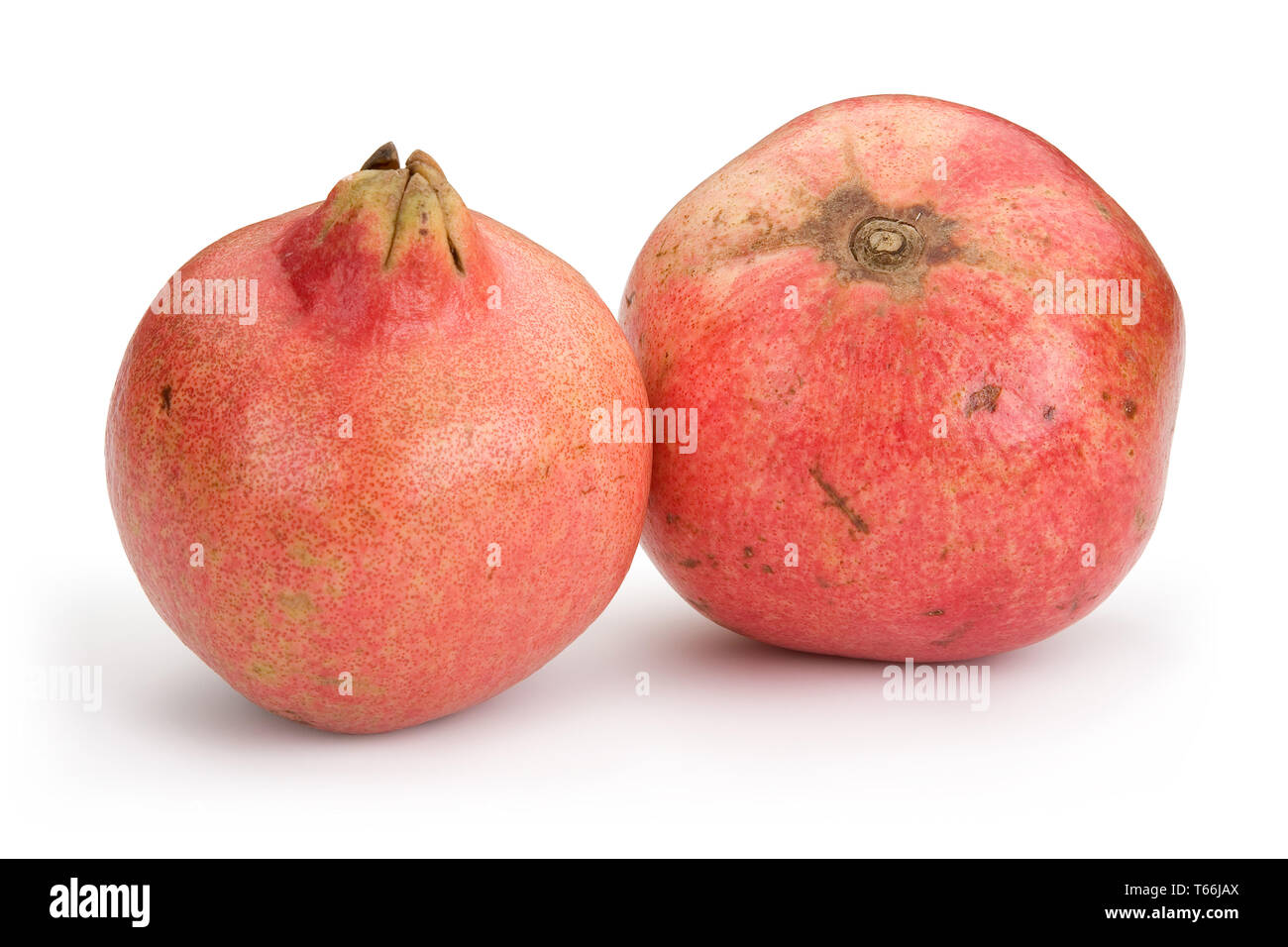 Two whole pomegranate fruits isolated on white background Stock Photo ...