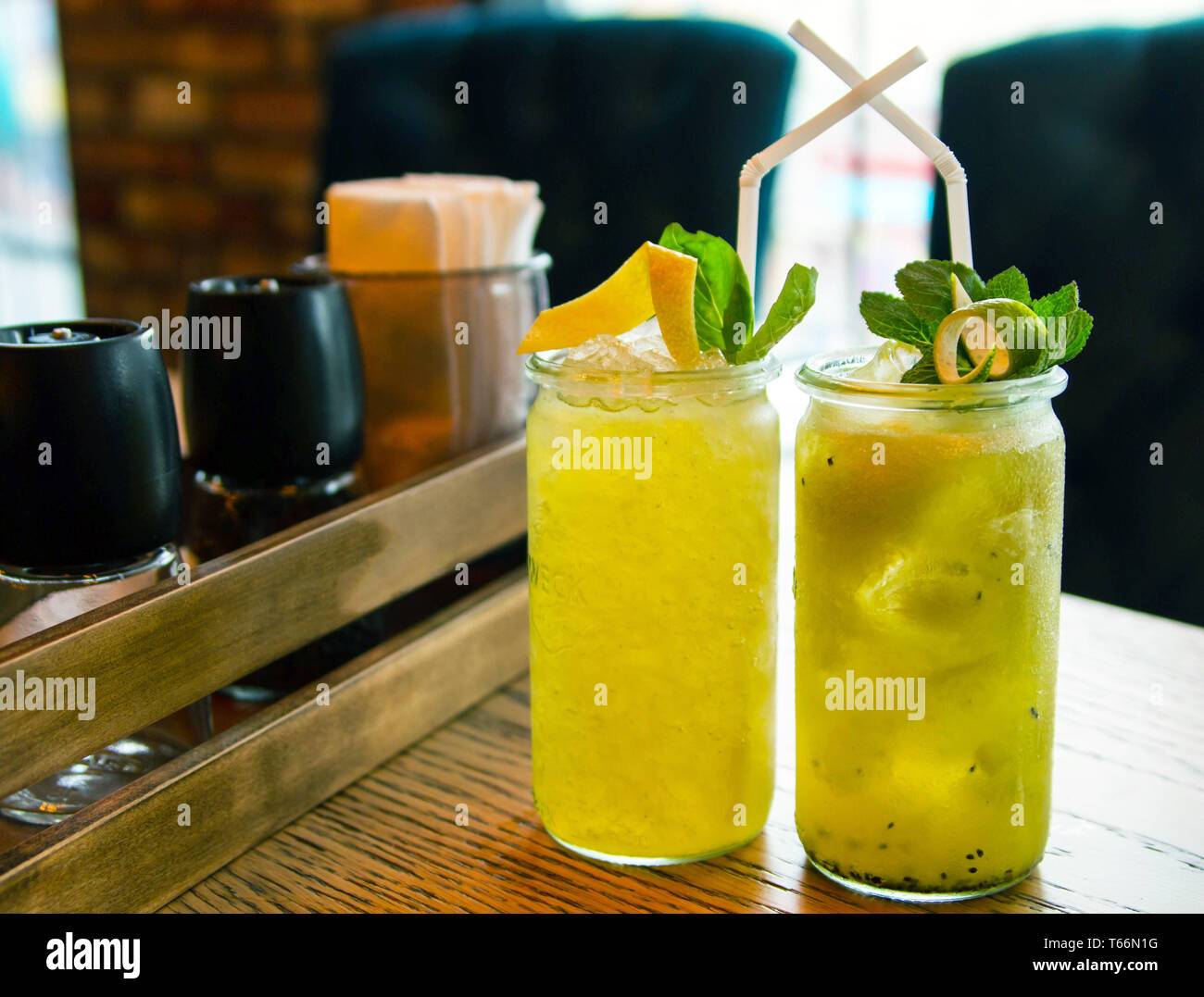 Two servings of fresh lemonade on the table of the summer cafe Stock ...