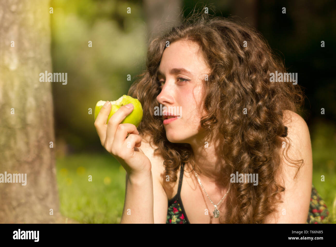 Young pretty woman eating apple hi-res stock photography and images - Alamy