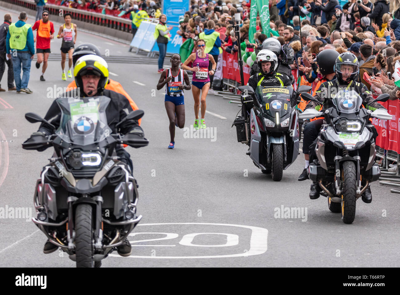 Man and woman racing motorbikes hi-res stock photography and images - Alamy