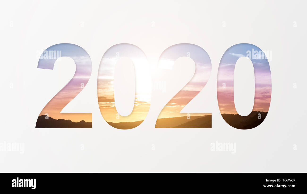 2020 year number over mountain sunset background Stock Photo - Alamy