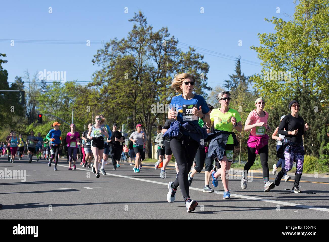 Participants running in the 2019 Eugene Marathon in Eugene, Oregon, USA ...